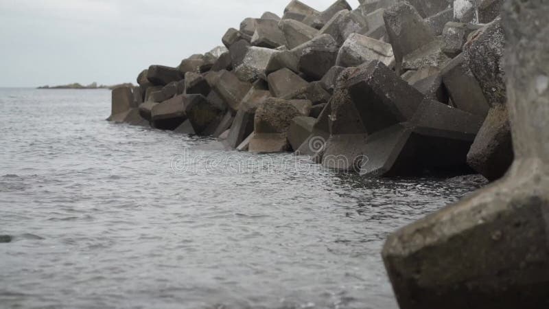Wave-breaking Blocks Lined Up in the Sea Stock Footage - Video of ...