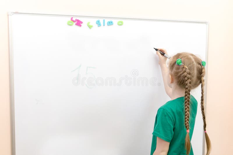 An Image of a White Board with a Girl Primary Education, Mathematics ...