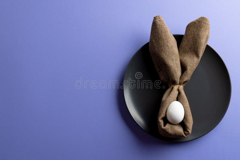 Image of White Easter Egg and Bunny Ears on Black Plate and Copy Space ...