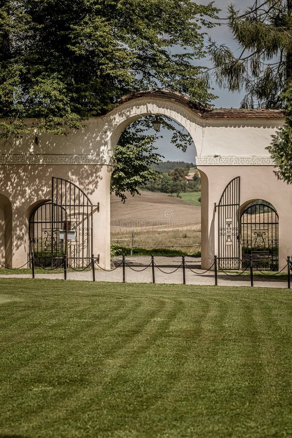 Image of a Wide Open Gate of a Park with a Manicured Lawn Stock Image ...