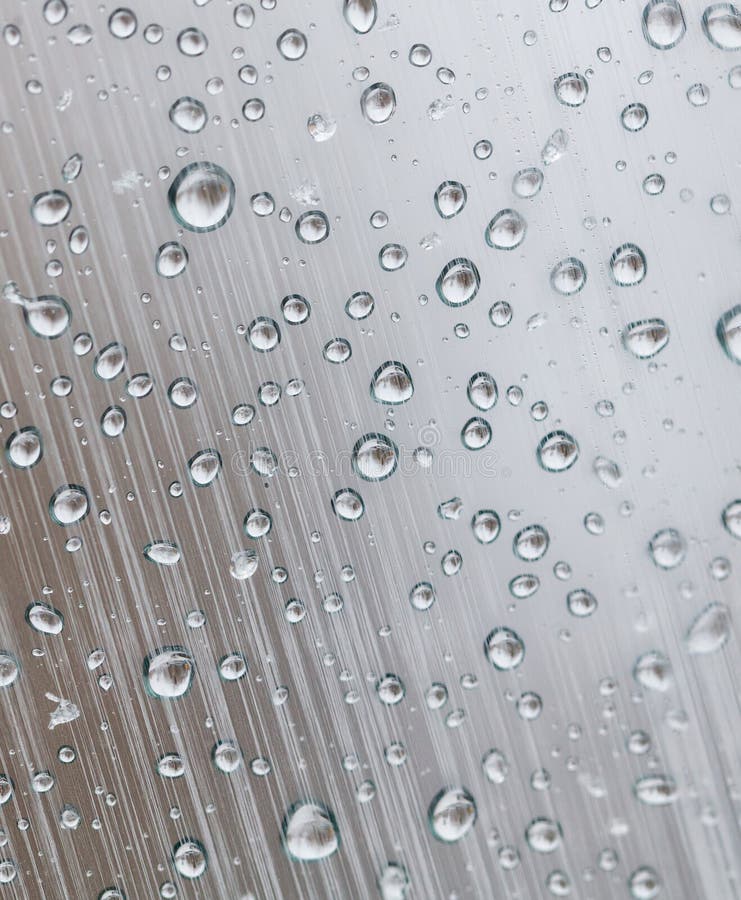 The Image is of a Window with Raindrops on it Stock Photo - Image of ...