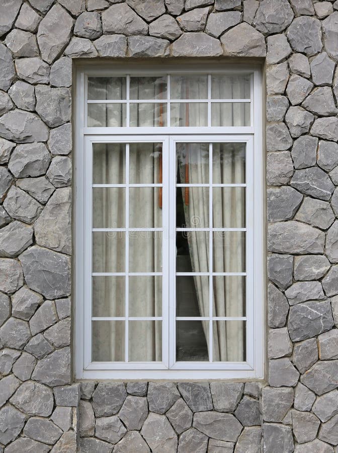 Window on stone wall stock photo. Image of ancient, rock - 136047430