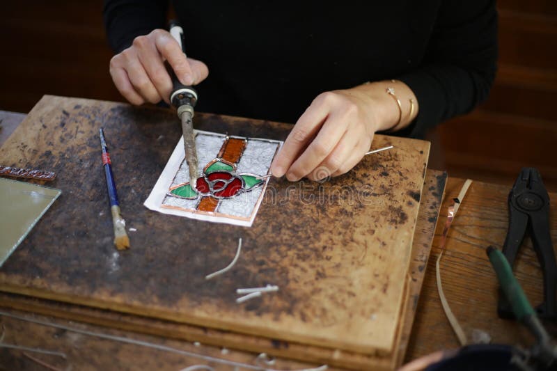 A Woman Creating Stained Glass Works Stock Photo - Image of high ...