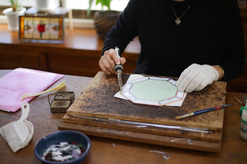 A Woman Creating Stained Glass Works Stock Image - Image of learn ...