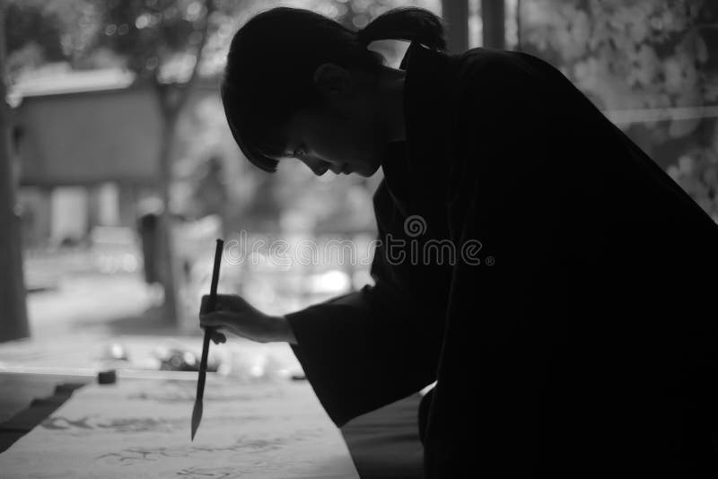 Female doing calligraphy stock image. Image of practice - 241189155