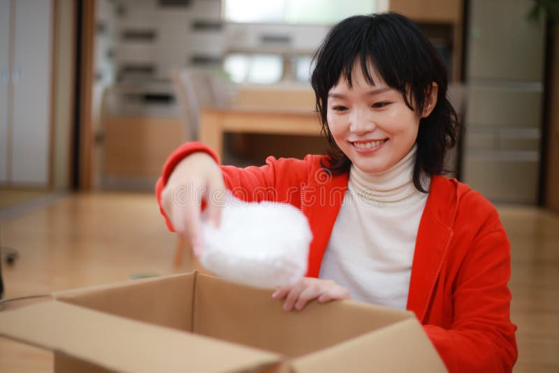 Woman packing work stock image. Image of housewife, courier - 242474797