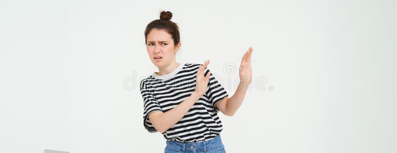 Image of Woman Expressing Aversion, Dislike Something, Looks Apalled ... Image of Woman Expressing Aversion, Dislike Something, Looks Apalled ...