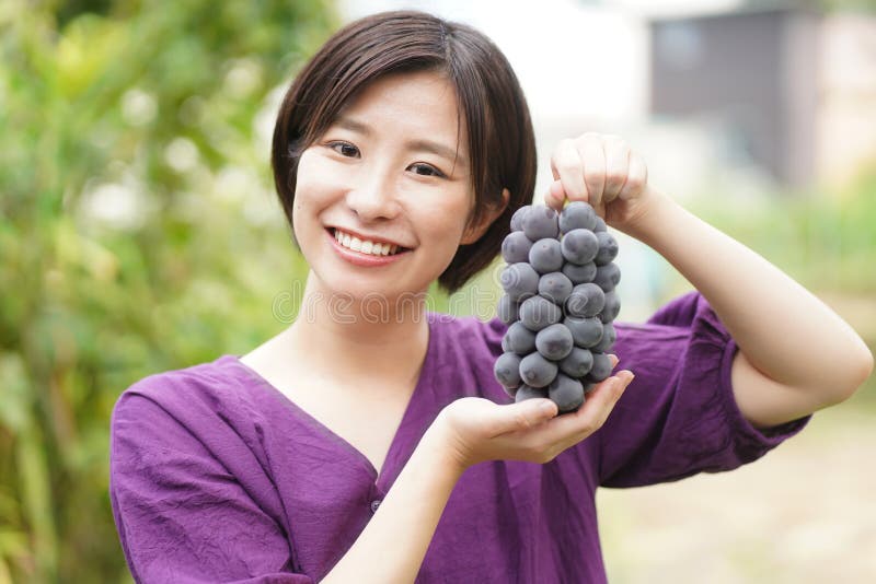 Woman with grapes stock photo. Image of copy, agriculture - 243903572
