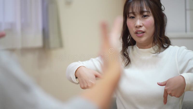A Woman Learning Sign Language (days of the Week) Stock Footage - Video ...