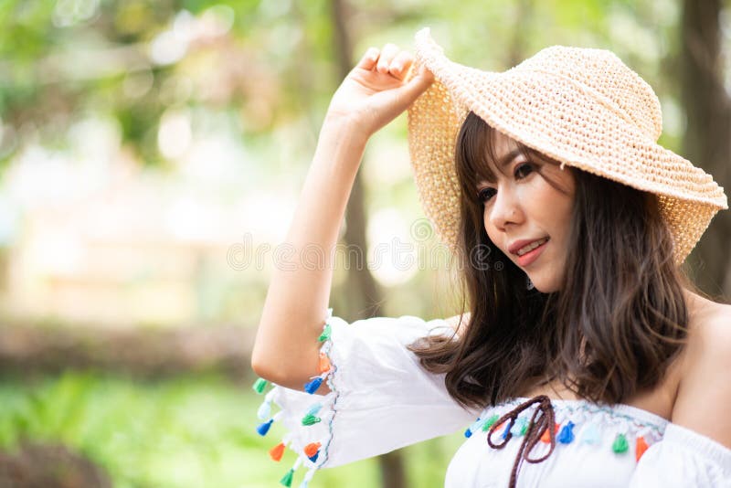 Image of Woman Wearing Hat stock image. Image of park - 169060675