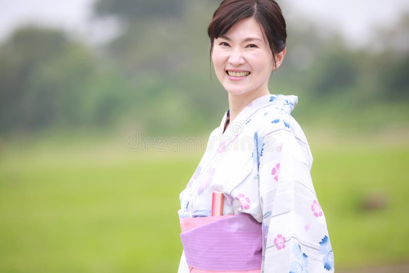 Woman in yukata stock image. Image of young, japan, yukata - 242728561