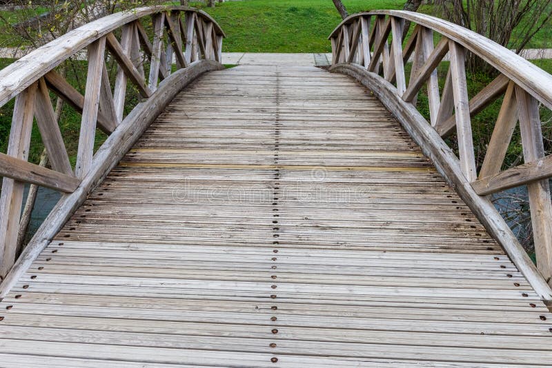Wooden Bridge Over the River Stock Image - Image of peaceful, brown ...