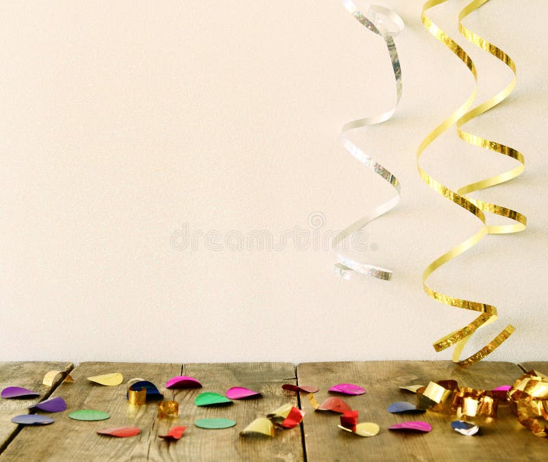 Image of Wooden Table with Colorful Confetti Stock Image - Image of ...