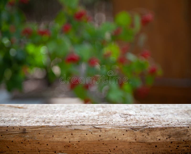 .image of Wooden Table in Front of Abstract Blurred Background of Stock ...