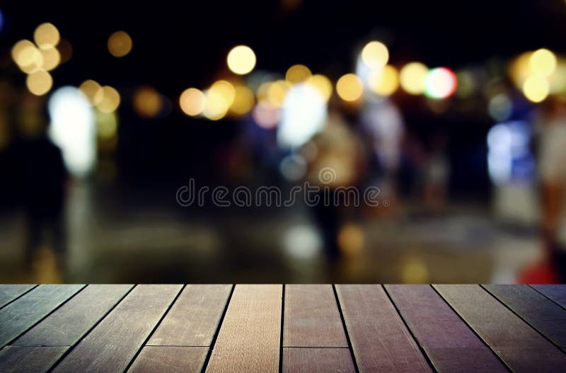 Image of Wooden Table in Front of Abstract Blurred Background Stock ...