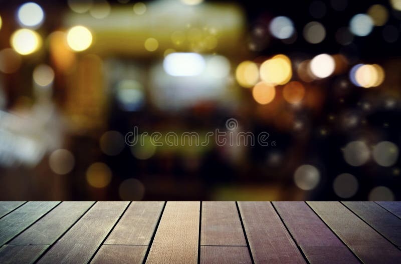 Image of Wooden Table in Front of Abstract Blurred Background Stock ...