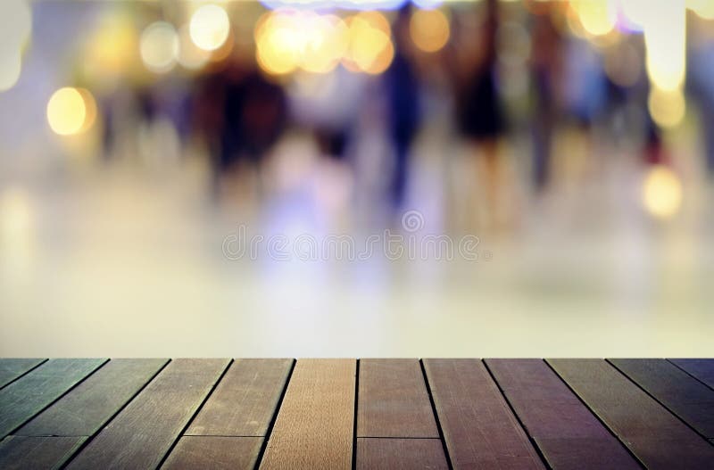 Image of Wooden Table in Front of Abstract Blurred Background Stock ...
