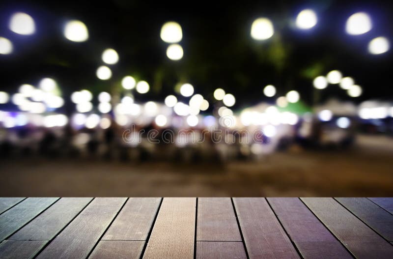 Image of Wooden Table in Front of Abstract Blurred Background Stock ...
