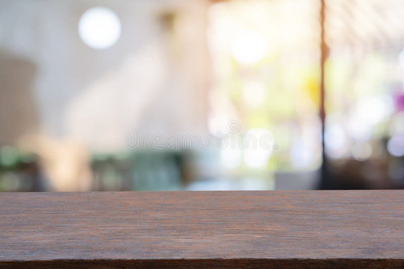 Image of Wooden Table in Front of Abstract Blurred Background Stock ...