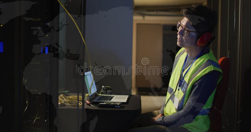 Image of World Map Over Asian Male Worker in Server Room Stock Photo ...