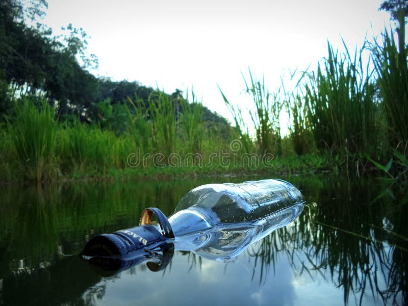 Woter bottle in the river stock image. Image of bottle - 133847069