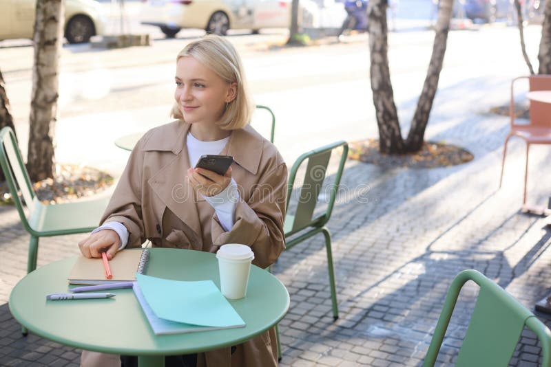 Image of Young Beautiful Girl, Student Studying, Doing Homework in Cafe ...