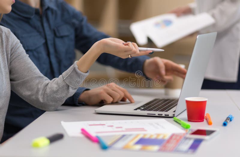 Image of Young Business Team Discussing Project at Computer Stock Image ...