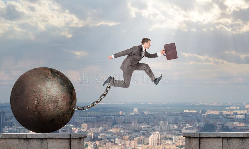 Image of Young Businessman Jumping Over Gap Stock Photo - Image of ...