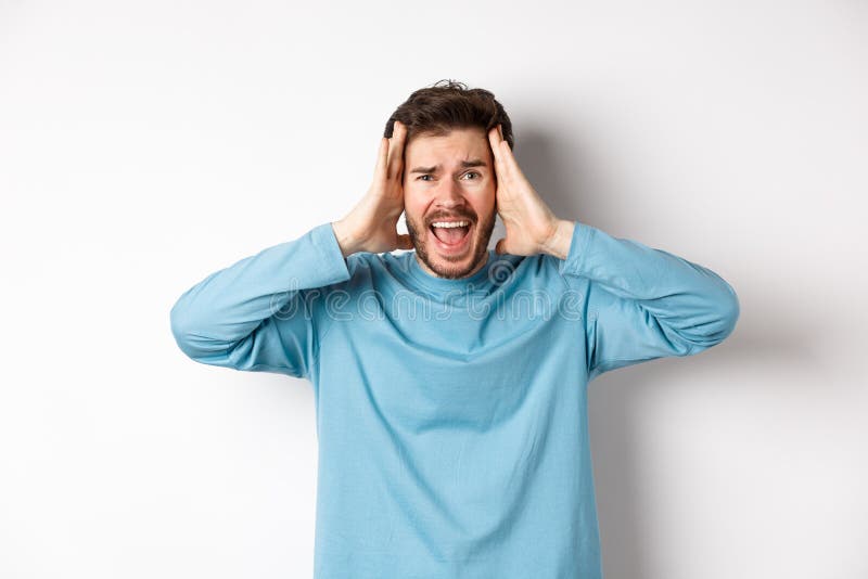 Image of Young Caucasian Man Screaming in Panic, Looking Frustrated and ...