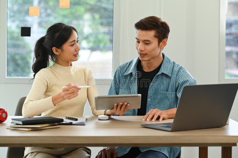 Image of Young Creative People Discussing Online Information, Sharing ...
