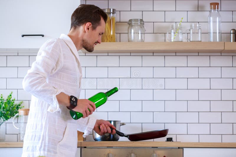 Image of Young Man Cooking Food Stock Photo - Image of adult, healthy ...