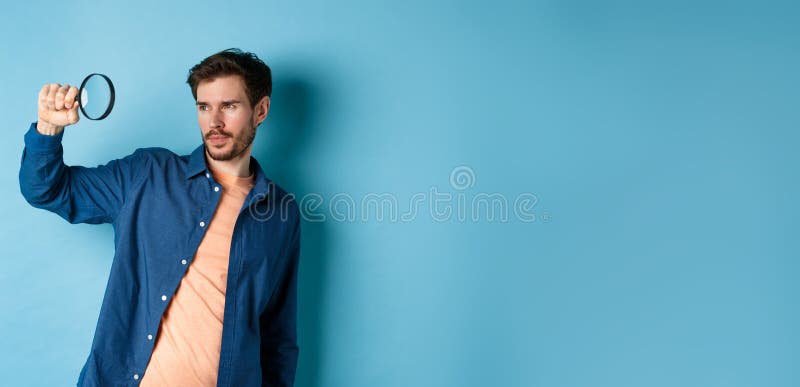 Image of Young Man Searching for Something, Looking at Empty Space with ...