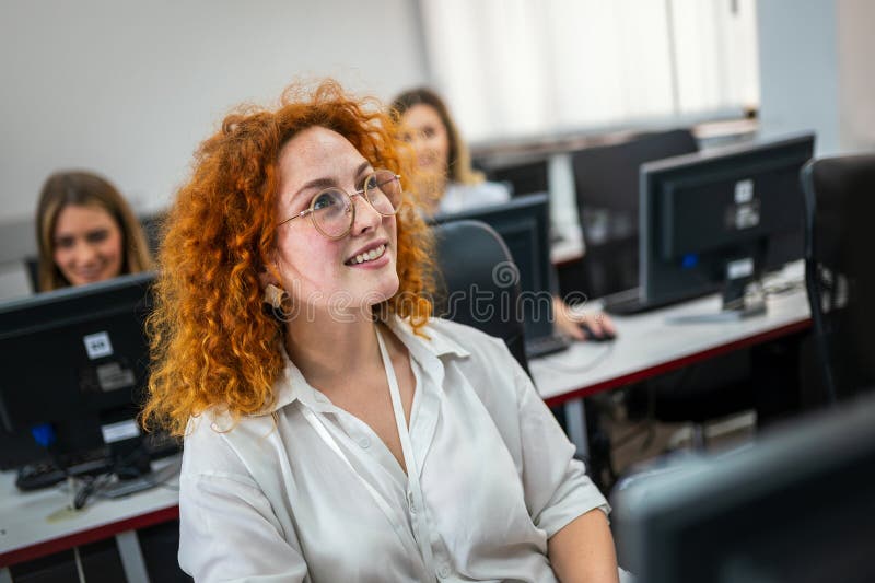 Yyoung People Sitting at the Tables in Computer Class Stock Photo ...