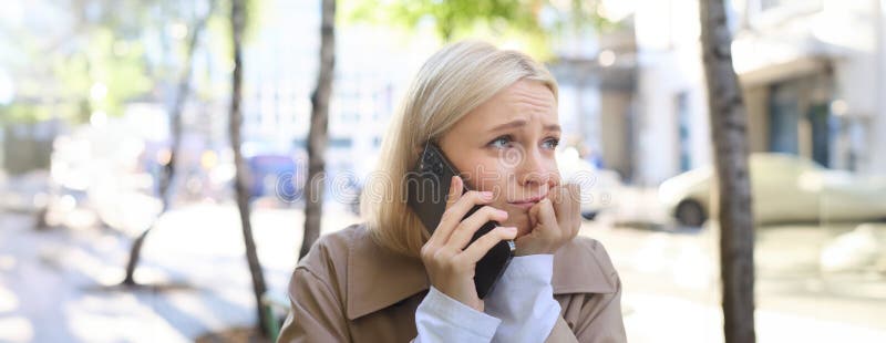 Image of Young Stressed, Upset Woman, Talking on Mobile Phone with ...