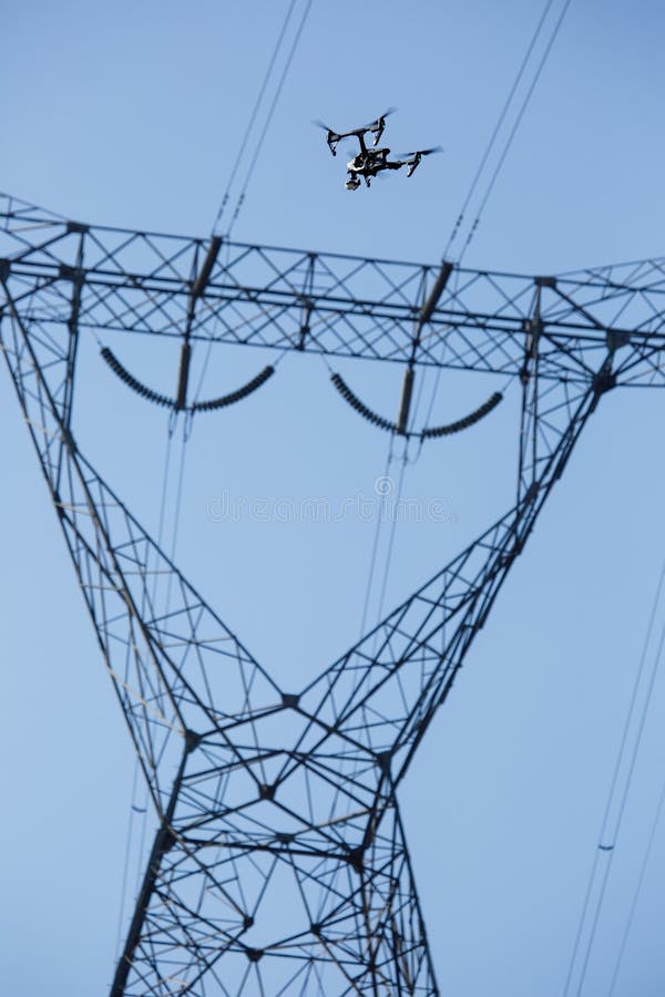 Images of Power Line Tower. Drone Making Inspection Around it Stock ...