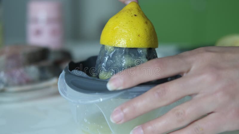 Squeezing a Lemon stock footage. Video of fruit, kitchen - 248355642