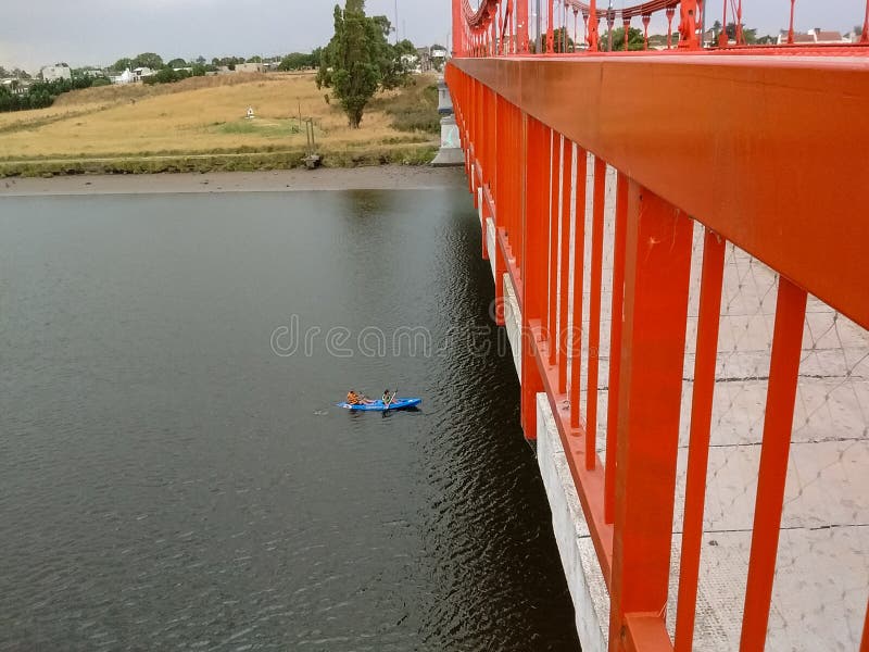 Kayak under the bridge editorial photo. Image of cityscape - 128264196