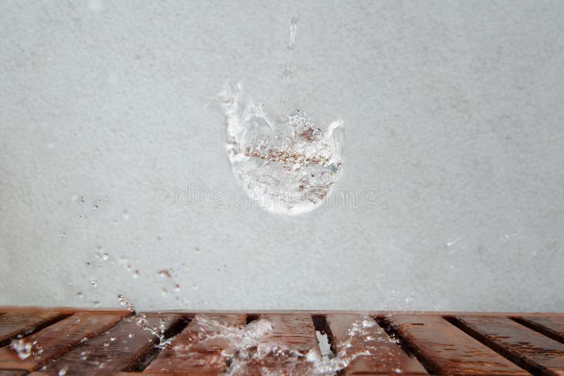 Imaginary Water Glass Splash on Wooden Desk Stock Photo - Image of ...
