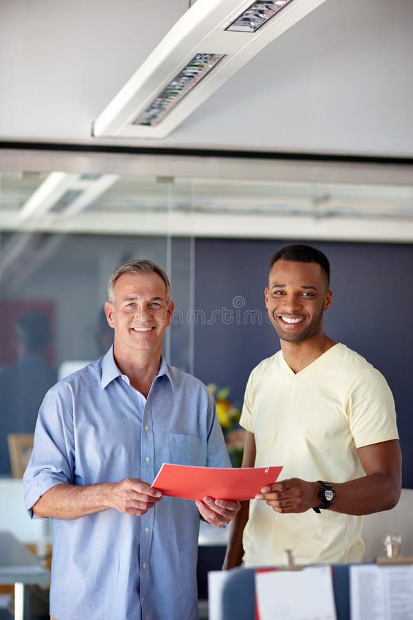 Imagination Will Get You Everywhere. Two Professionals Working Together ...