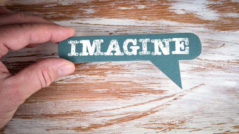 Imagine. Green Speech Bubble in a Man& X27;s Hand on a Wooden ...