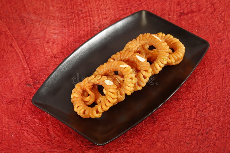 Imerti - Indian Sweets Red Back Ground Stock Photo - Image of sugar ...