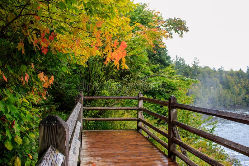 Wooden Bridge in Autumn Forest Located in the Tahquamenon Falls State ...