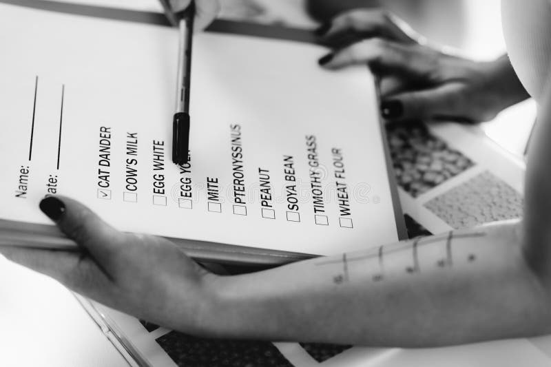 Immunology Doctor Looking at a List with Allergens Stock Image - Image ...