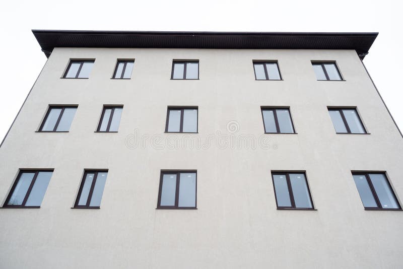 An Imperfect Simple House with Different Windows Stock Photo - Image of ...