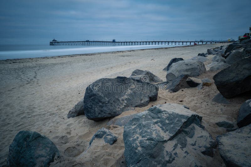 Imperial Beach Pier with Large Rocks on Beach Stock Image - Image of ...