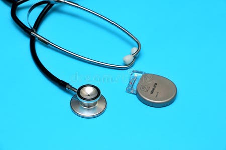 An Implantable Pacemaker Device Placed Along with a Stethoscope. Stock ...