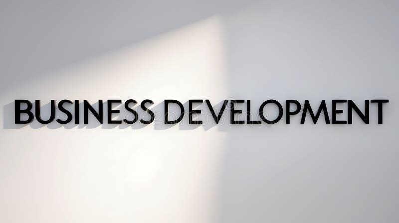 Importance of Business Development Emphasized on a Modern Wall Stock ...