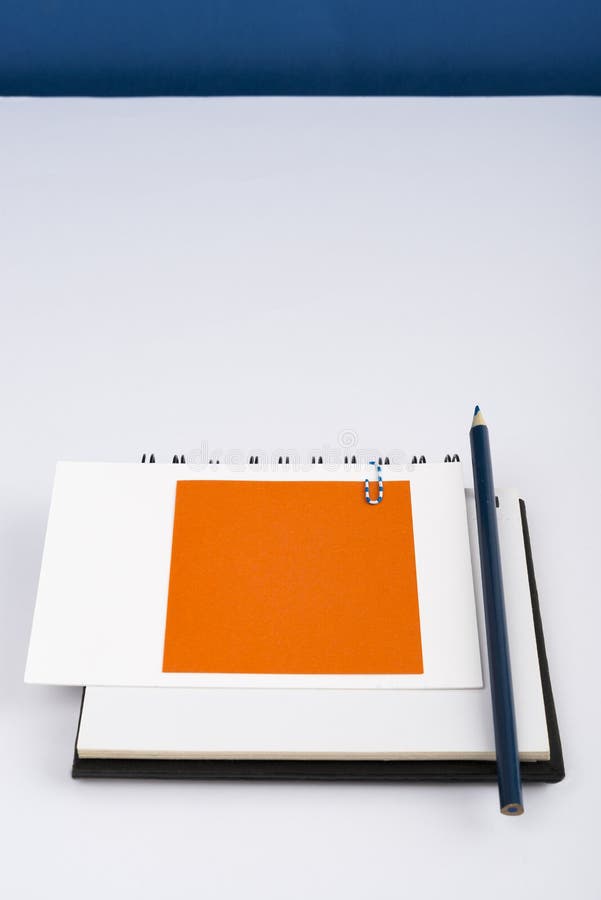 Important Message on Note Attached on Piece of Paper Above Notebook ...