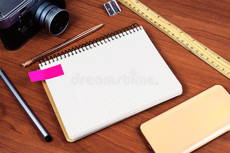 Important Message Presented on Notebook on Desk with Vintage Camera ...