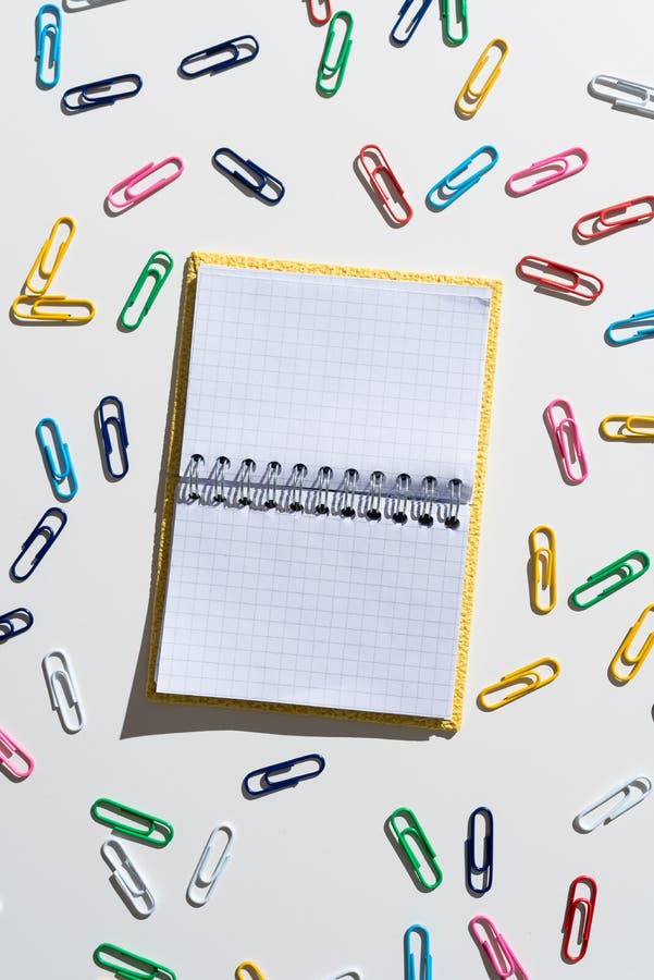 Important Message Written on Notebook with Colorful Paperclips Around ...